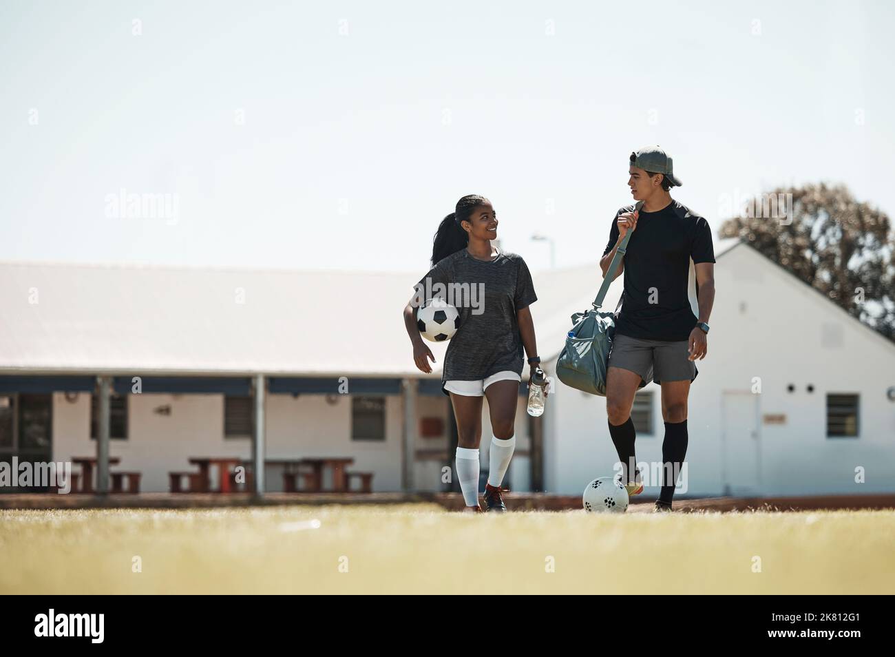 Soccer, sport and couple training for fitness, outdoor cardio and game ...