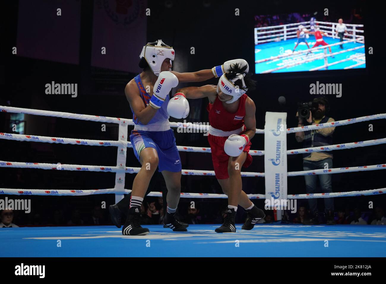 ISTANBUL, TURKEY - MAY 19, 2022: Jitpong Jutamas (Red) and Nikhat ...