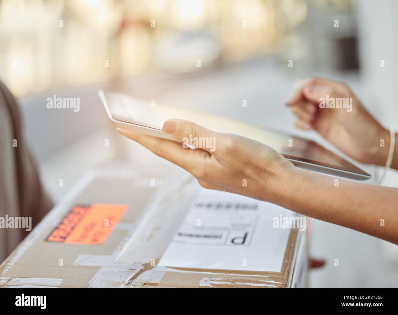 We just need your signature please. a female customer signing for her ...