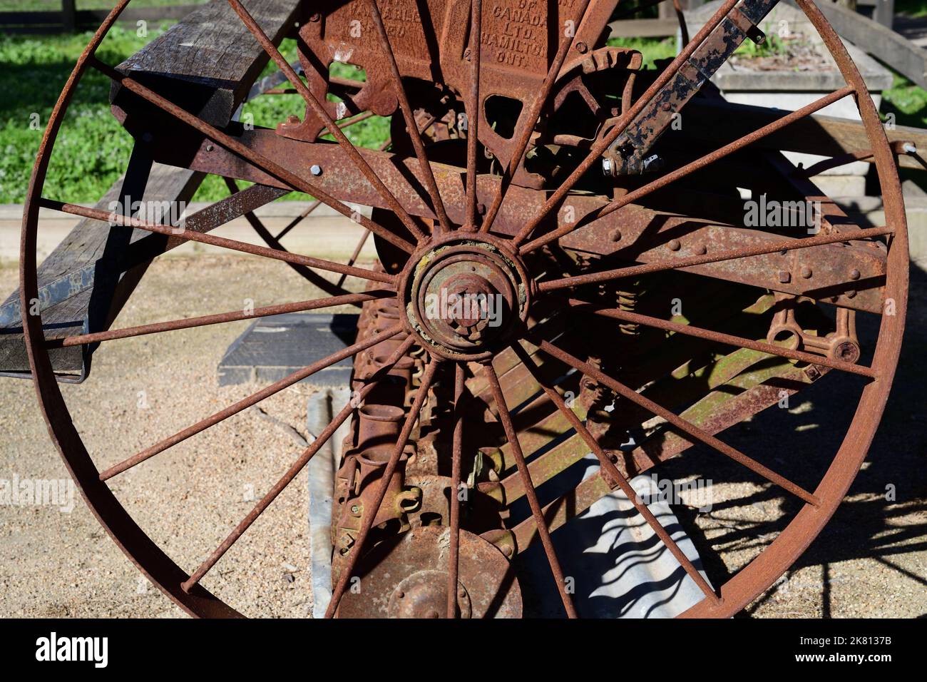 Vintage plough with rusty wheel Stock Photo - Alamy