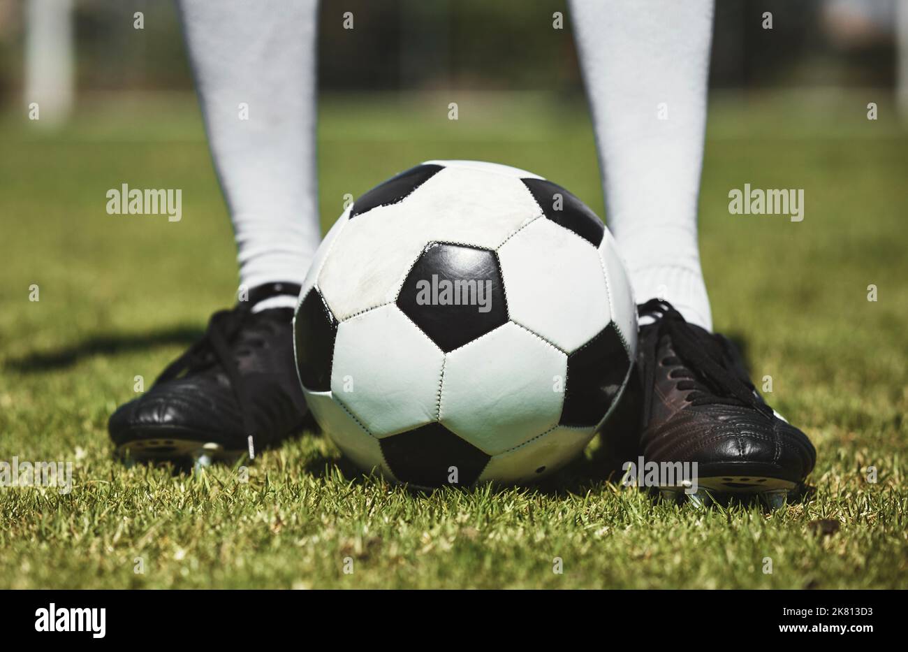 Soccer ball, football player and game of athlete on a sports field for ...