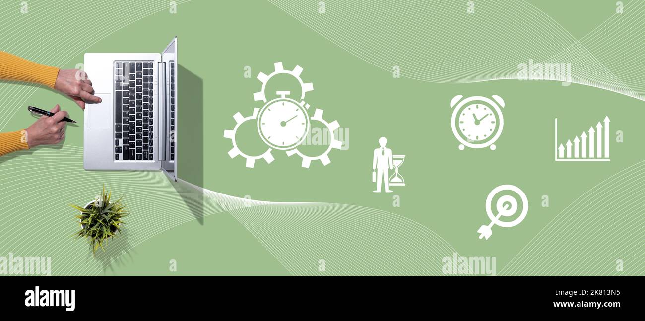 Top view of hands using laptop with symbol of productivity concept ...