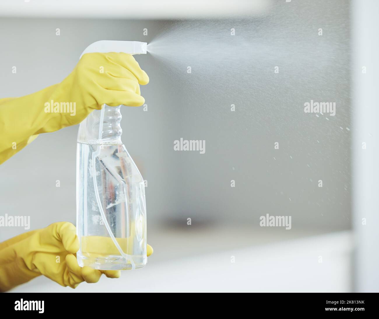 Hand holding cleaning cloth spraying hi-res stock photography and ...