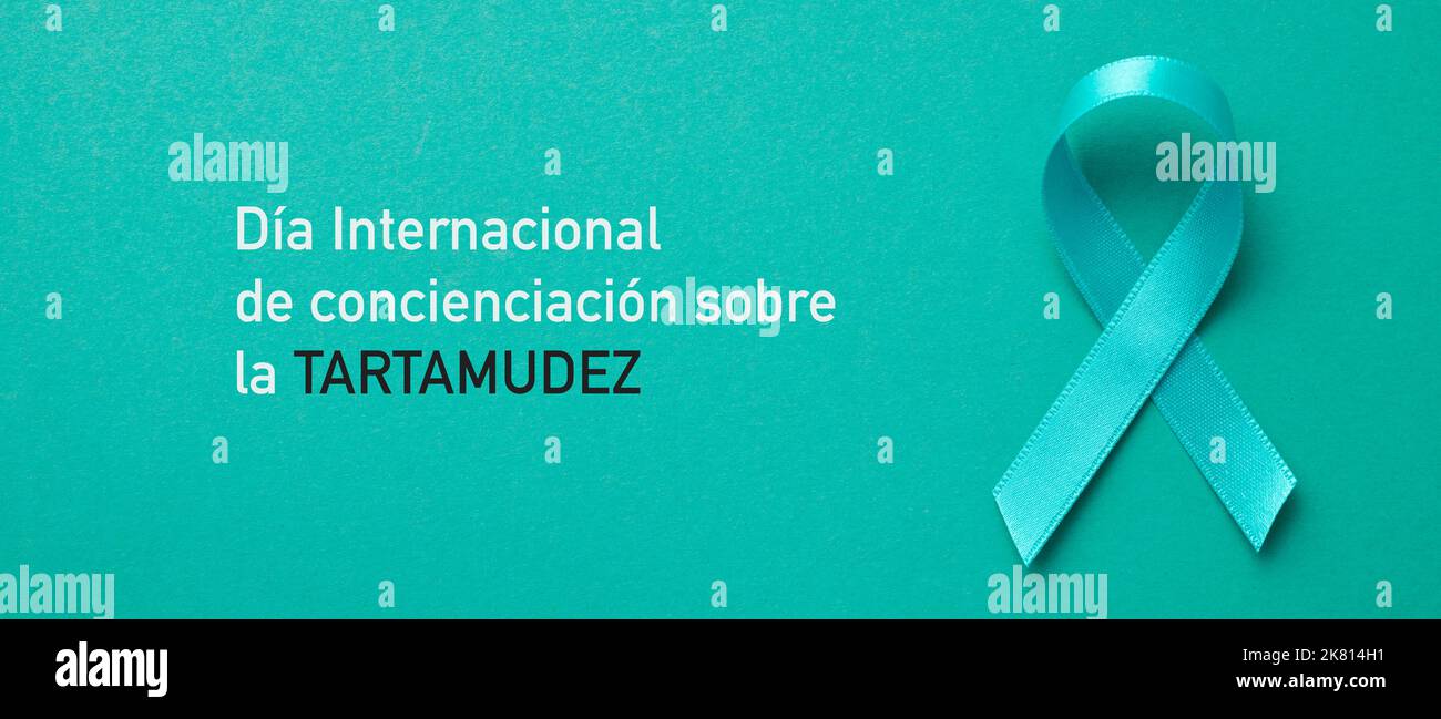 an aquamarine awareness ribbon supporting those who stutter and the ...