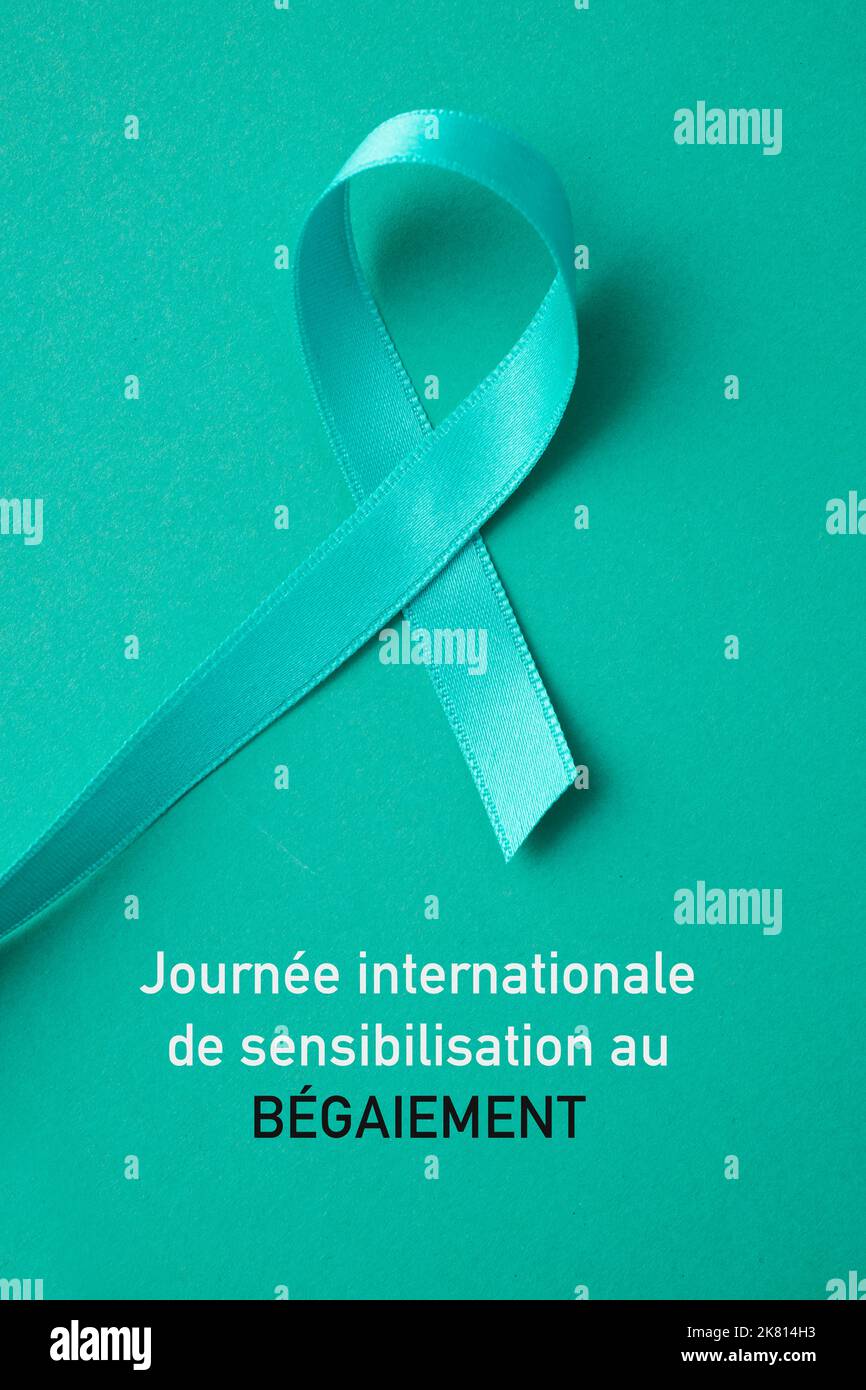 an aquamarine awareness ribbon supporting those who stutter and the ...