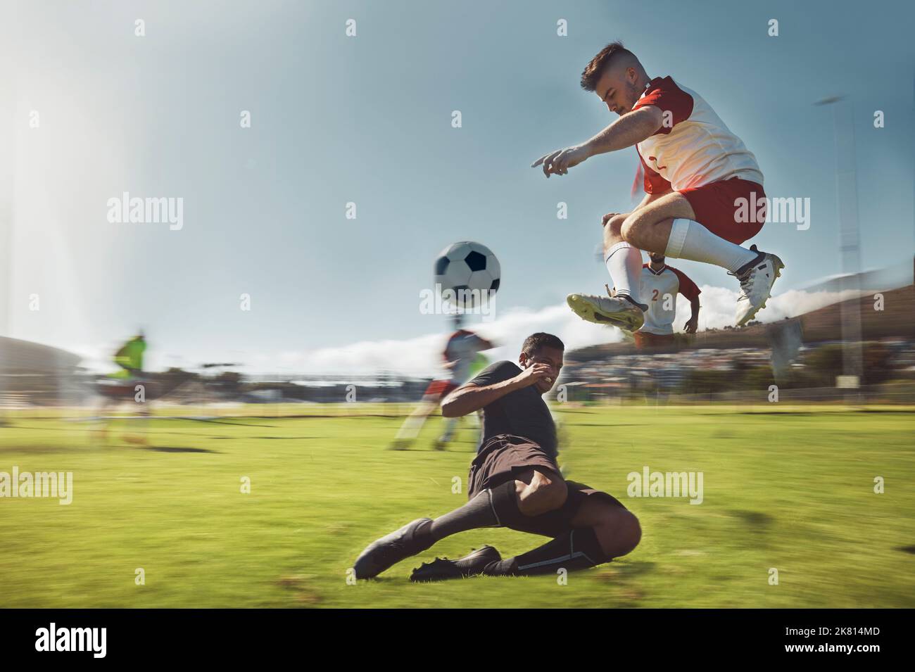 Action challenge slide football hi-res stock photography and images - Alamy