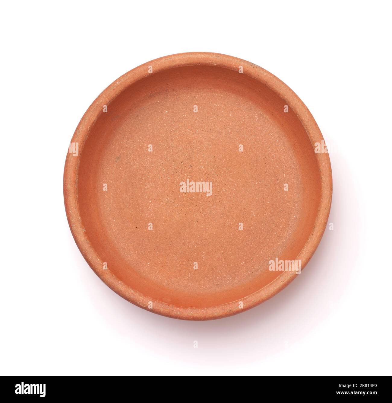 Top view of empty round clay baking pan isolated on white Stock Photo ...