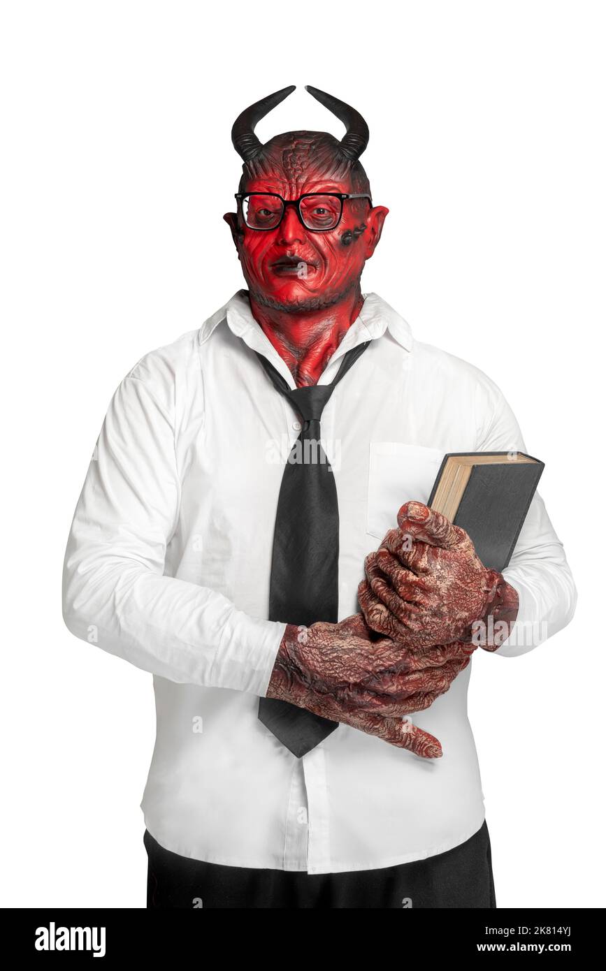 Devilman is standing and holding the book isolated over white ...