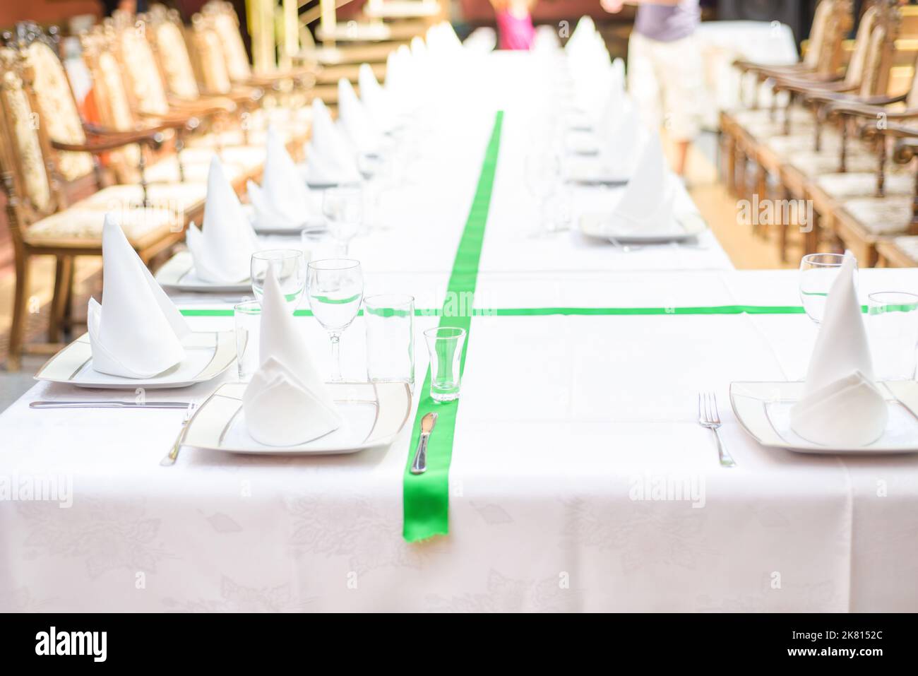 Long dining table with chairs hi-res stock photography and images - Alamy