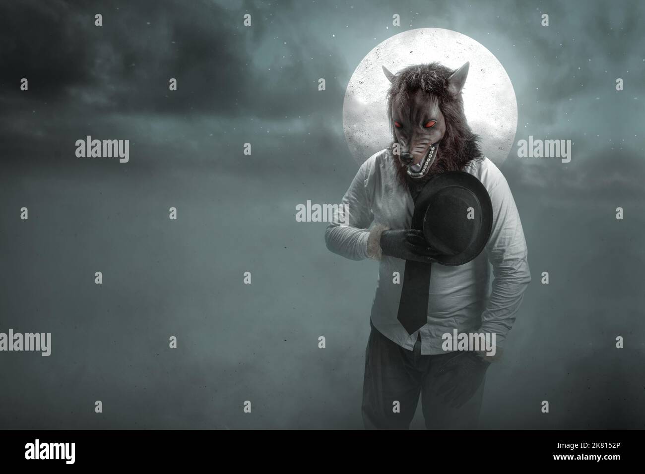 A werewolf with a full moon and night scene background. Halloween ...