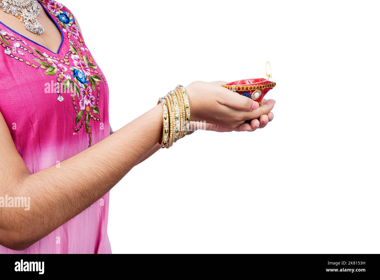 Hand holding diya hi-res stock photography and images - Alamy