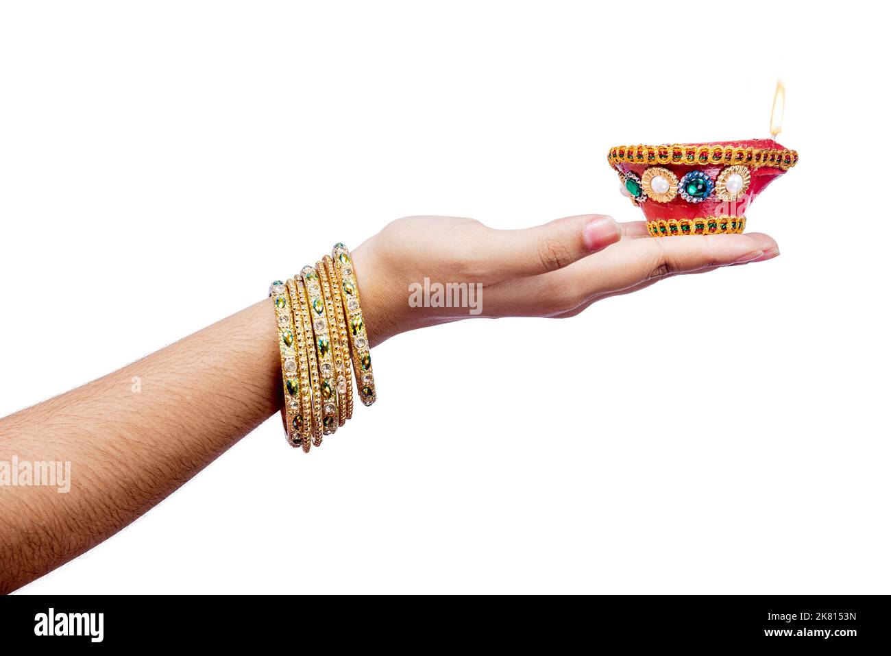 Woman Hand Holding Diya Oil Lamps For The Diwali Festival Isolated Over