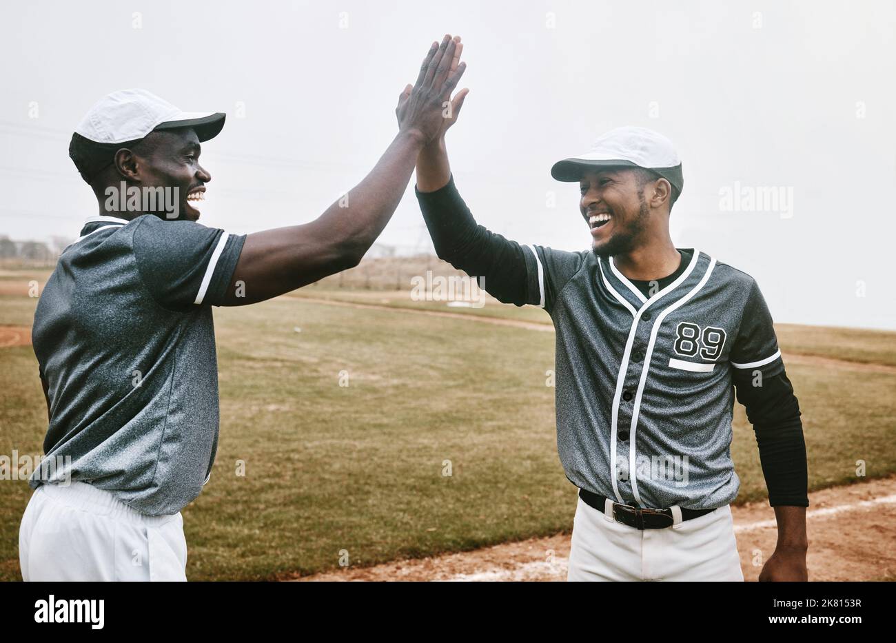 Sports celebration, high five and motivation together with smile happy ...