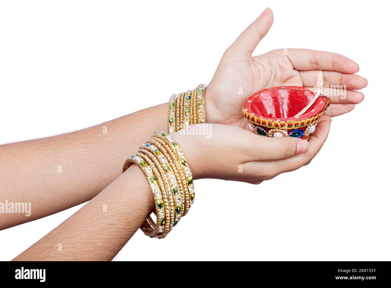 Woman Hand Holding Diya Oil Lamps For The Diwali Festival Isolated Over
