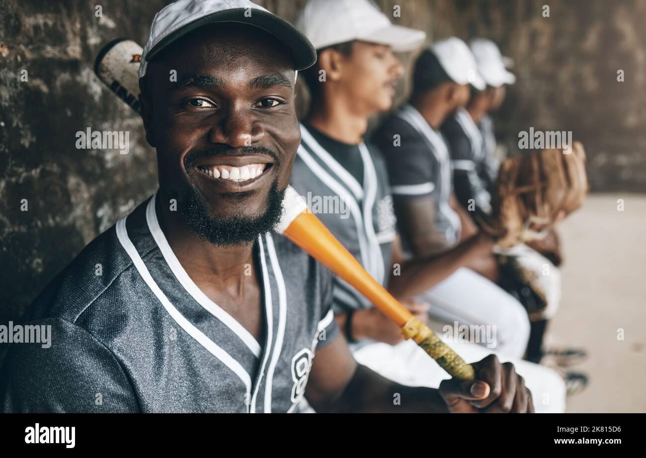 Baseball, sports and face with a man athlete holding a bat in a dugout ...