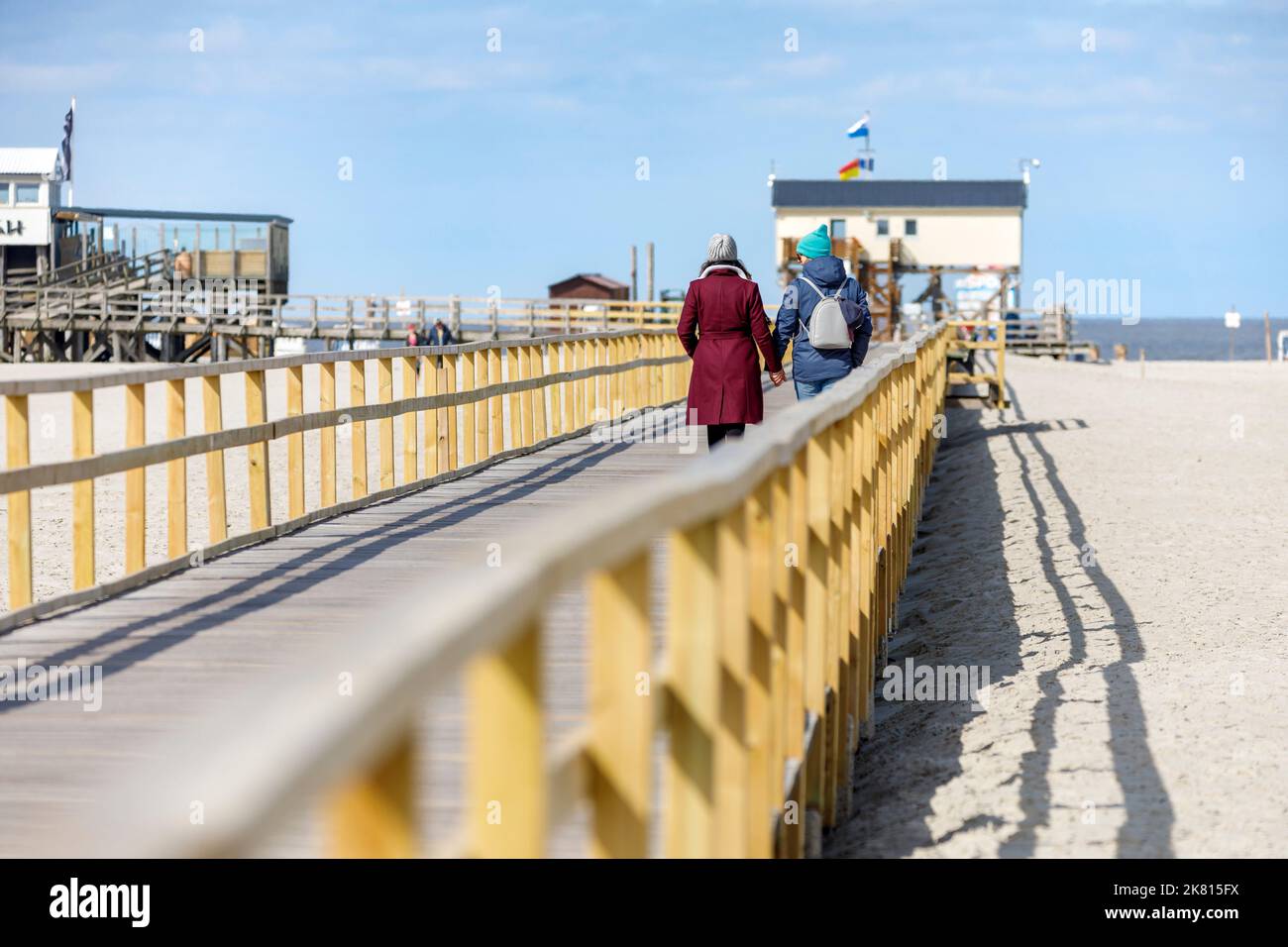 Pier to the Sankt Peter-Ording beach, at the end the sandbank with the ...