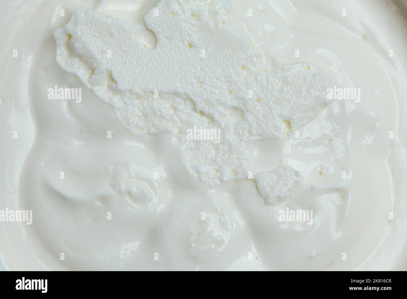 Cottage cheese texture background close-up Stock Photo - Alamy