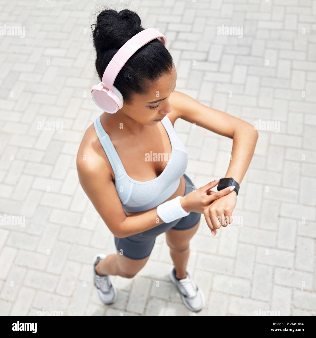 Fitness, woman and watch of runner time monitoring health, performance ...