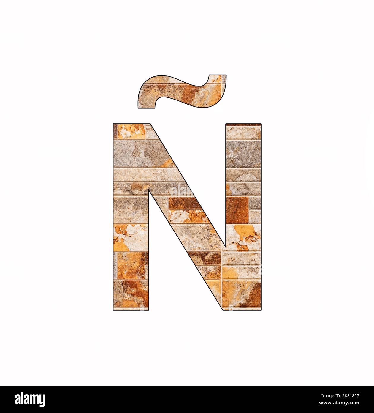 Alphabet letter Ñ - Rustic tile background Stock Photo - Alamy