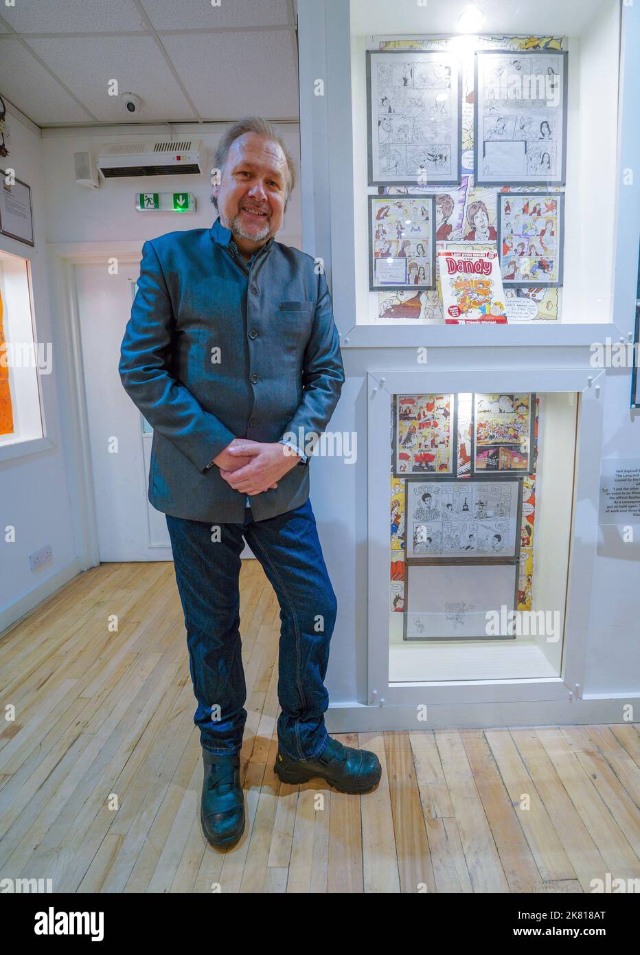 Dandy artist Nigel Parkinson next to his sketches and artwork of former ...