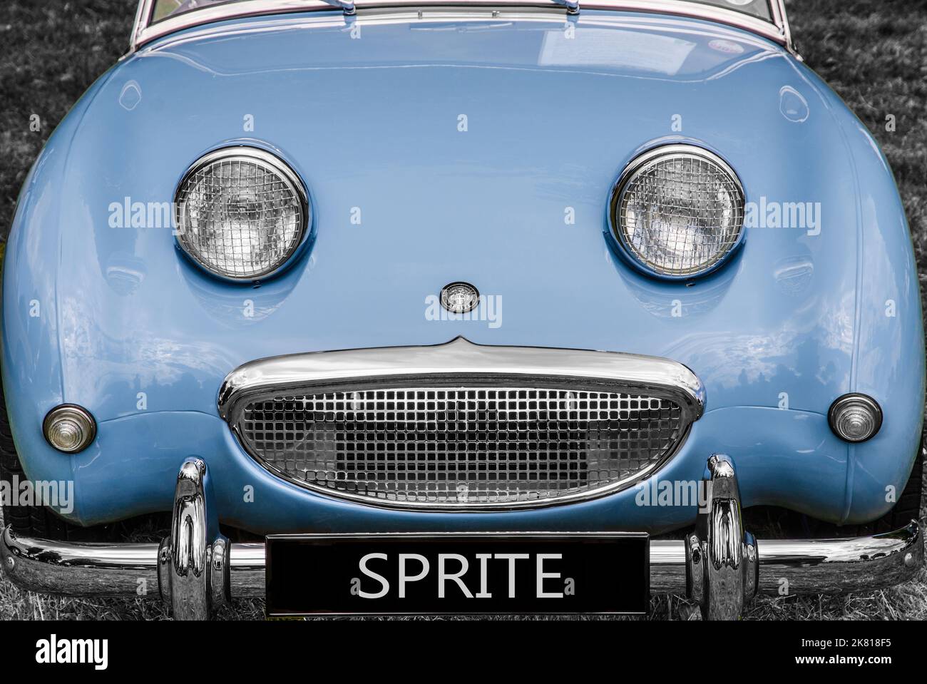Front view of a blue Austin Healey 'frog-eye' Sprite Stock Photo - Alamy