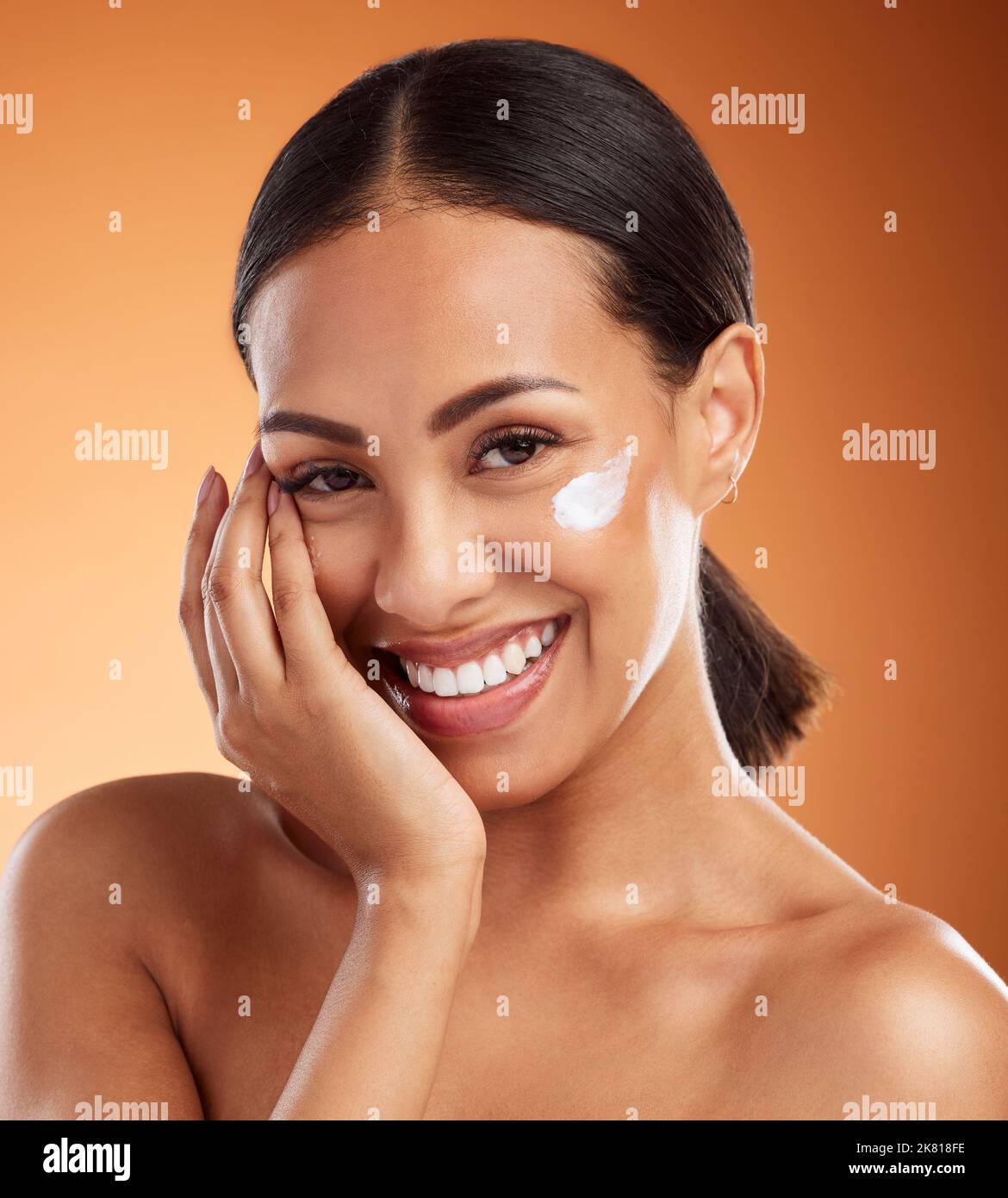 Skincare, beauty cream and woman with cream on face product against a ...