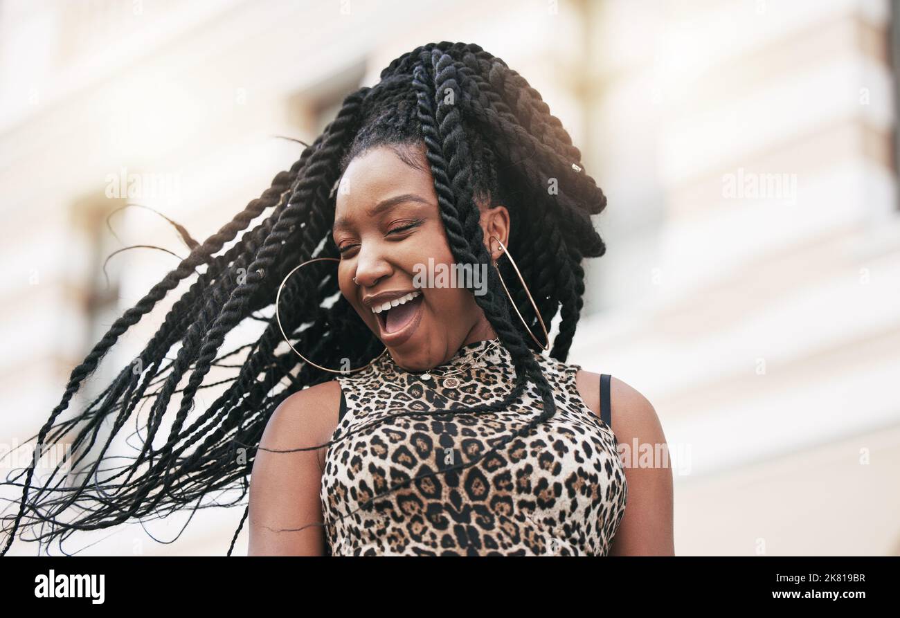 Hair, freedom and fashion with a fun black woman in the city on a ...