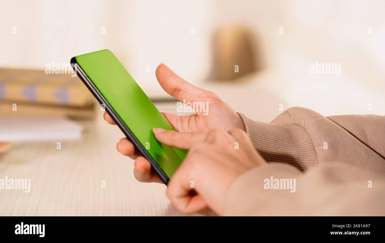 Woman cellphone green screen home hi-res stock photography and images ...