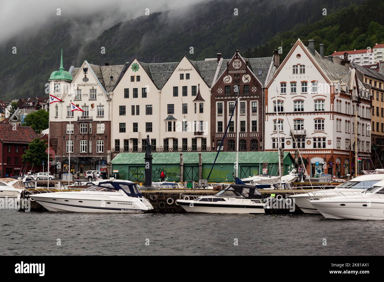 A beautiful shot of boats and the facades of the historical buildings ...