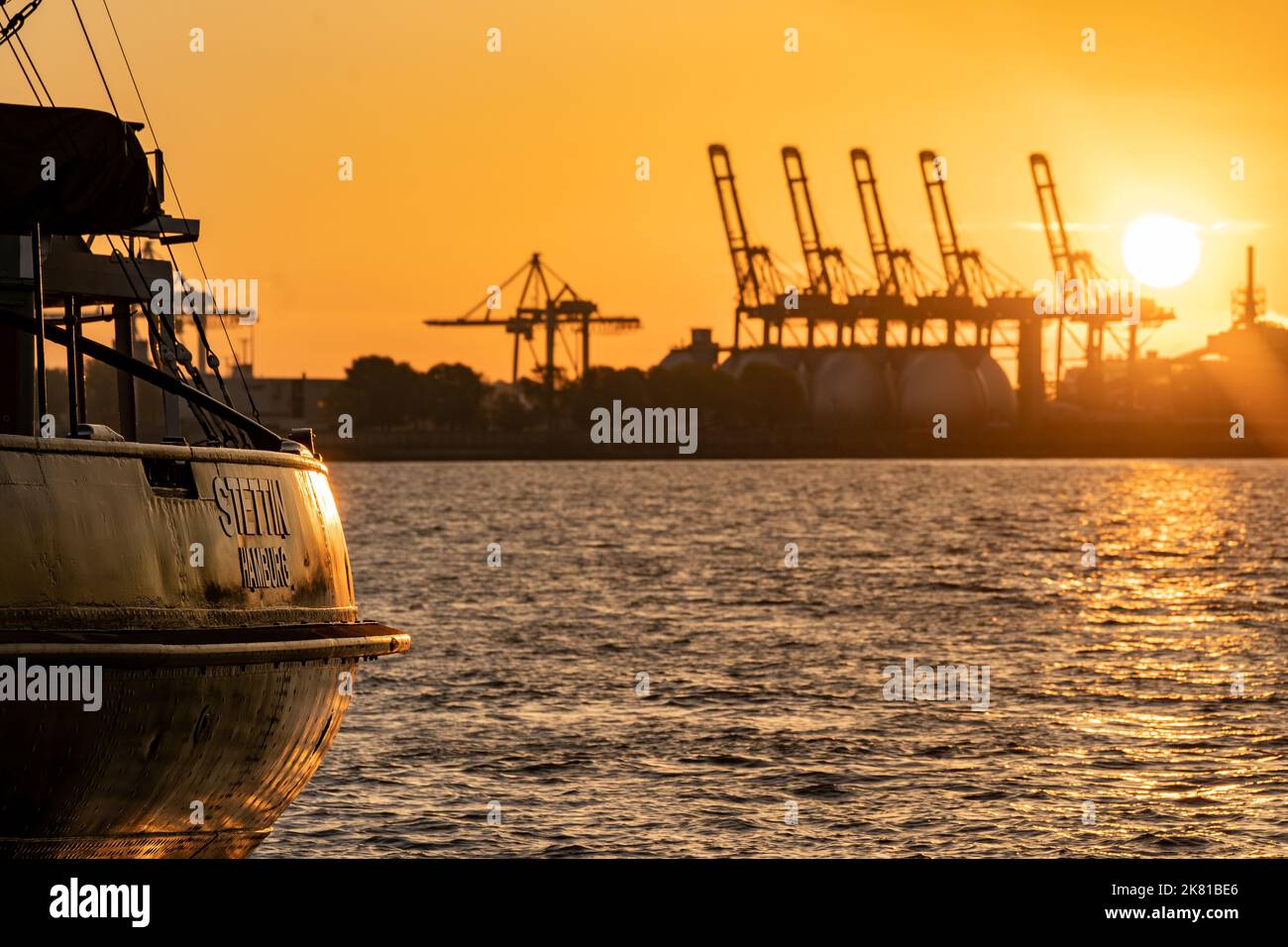 A Vessel in the Sunlight of the Rising Sun Stock Photo - Alamy
