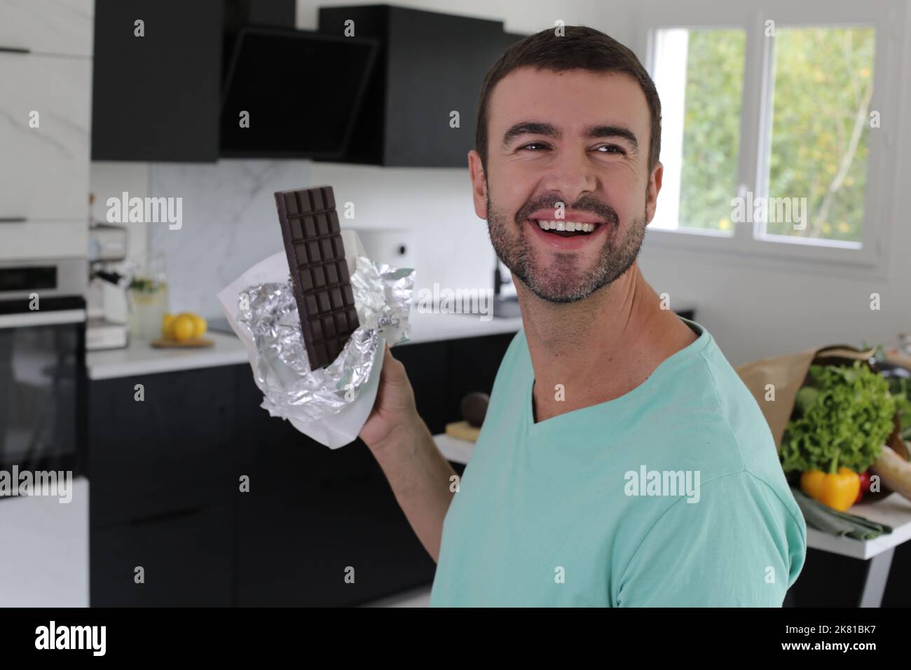 Man enjoying some delicious chocolate Stock Photo - Alamy