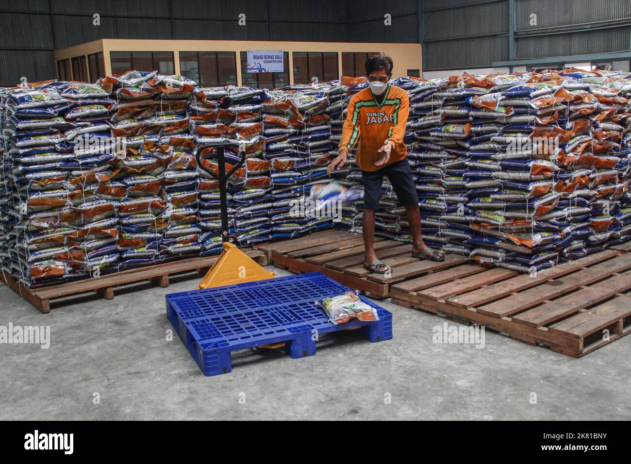 Bandung, West Java, Indonesia. 20th Oct, 2022. A worker unloading rice ...