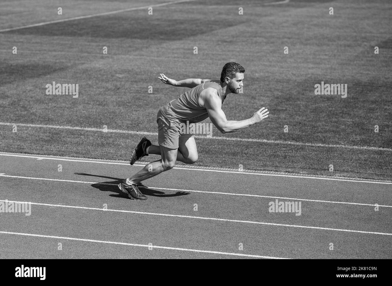 Runner at finish. Athlete runner prepare to race at stadium. Running ...