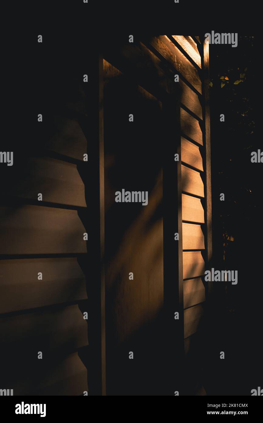 An entrance door at night with light Stock Photo - Alamy