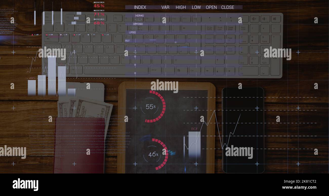 Image of financial data processing with statistics over desk computer ...