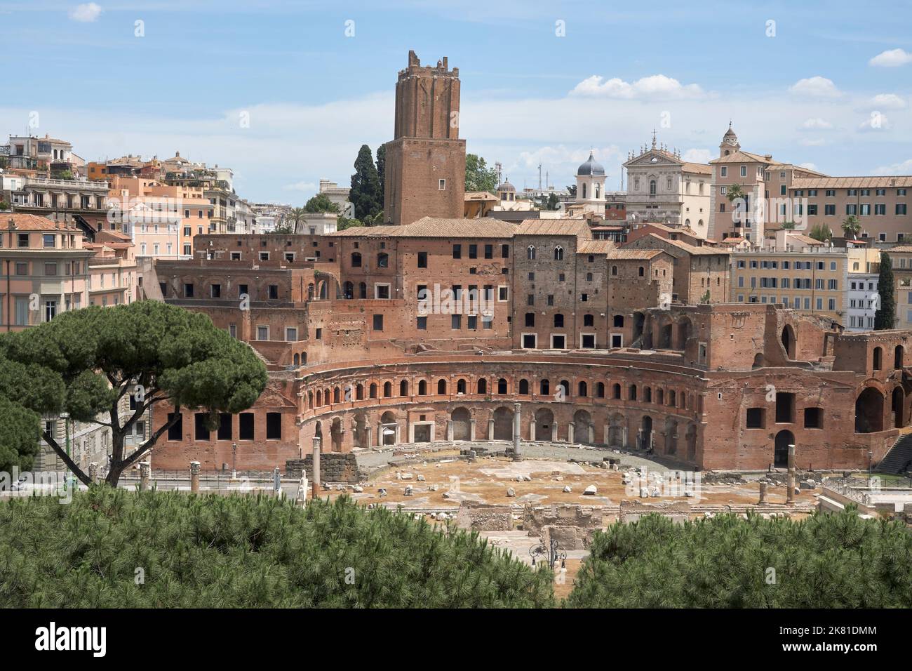 The old buildings of Rome with trees and cloudy sky Stock Photo - Alamy