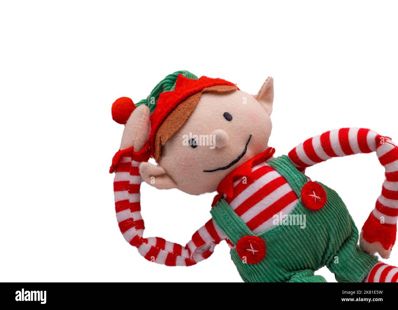 Elf on a shelf leaning left isolated on white background Stock Photo ...