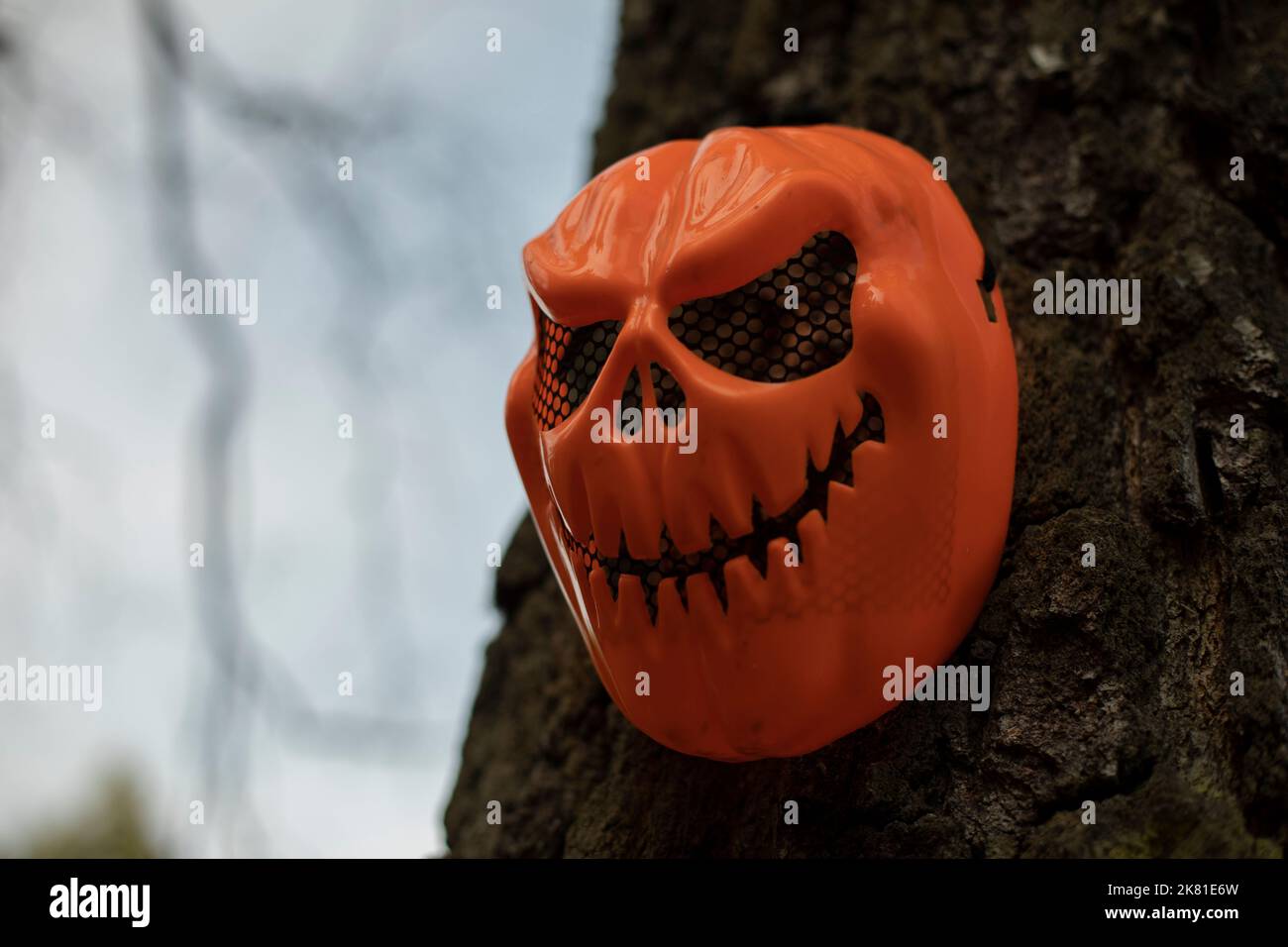 Terrible pumpkin mask. Halloween mask. Plastic face. Frightening smile ...