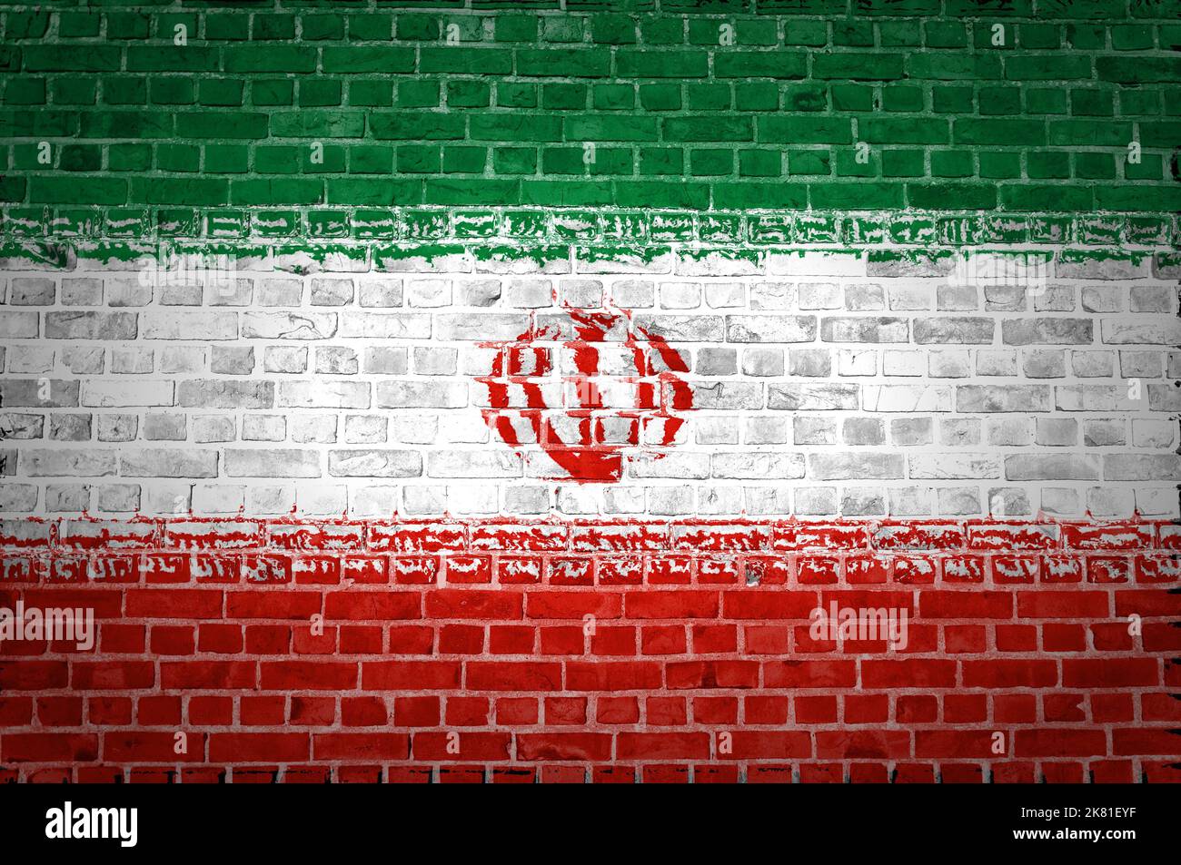 An image of the Iran flag painted on a brick wall in an urban location ...