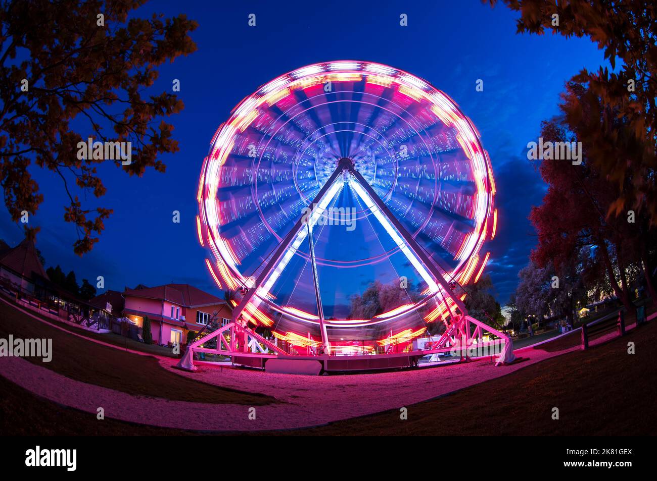 Ferris wheel go around at Lake Balaton at night Stock Photo - Alamy