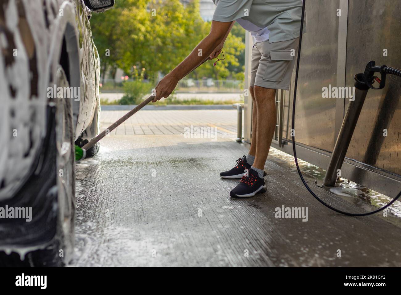 Man washing car hi-res stock photography and images - Alamy