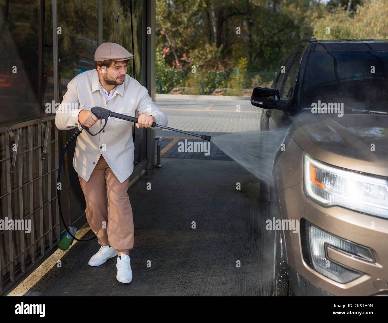 He loves his car. Man washing car Stock Photo - Alamy