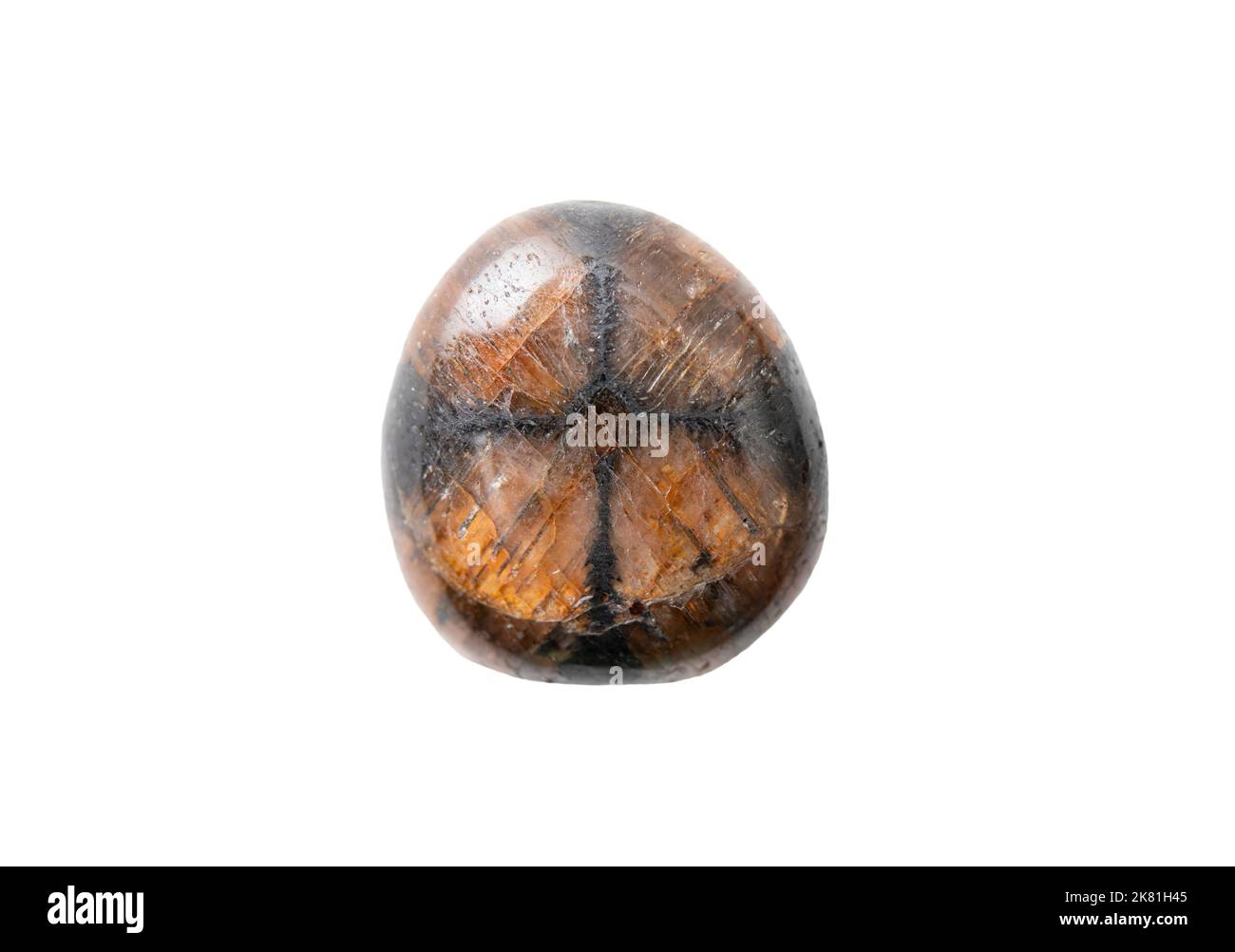 Tumbled gemstone crystal called chiastolite known as cross stone ...