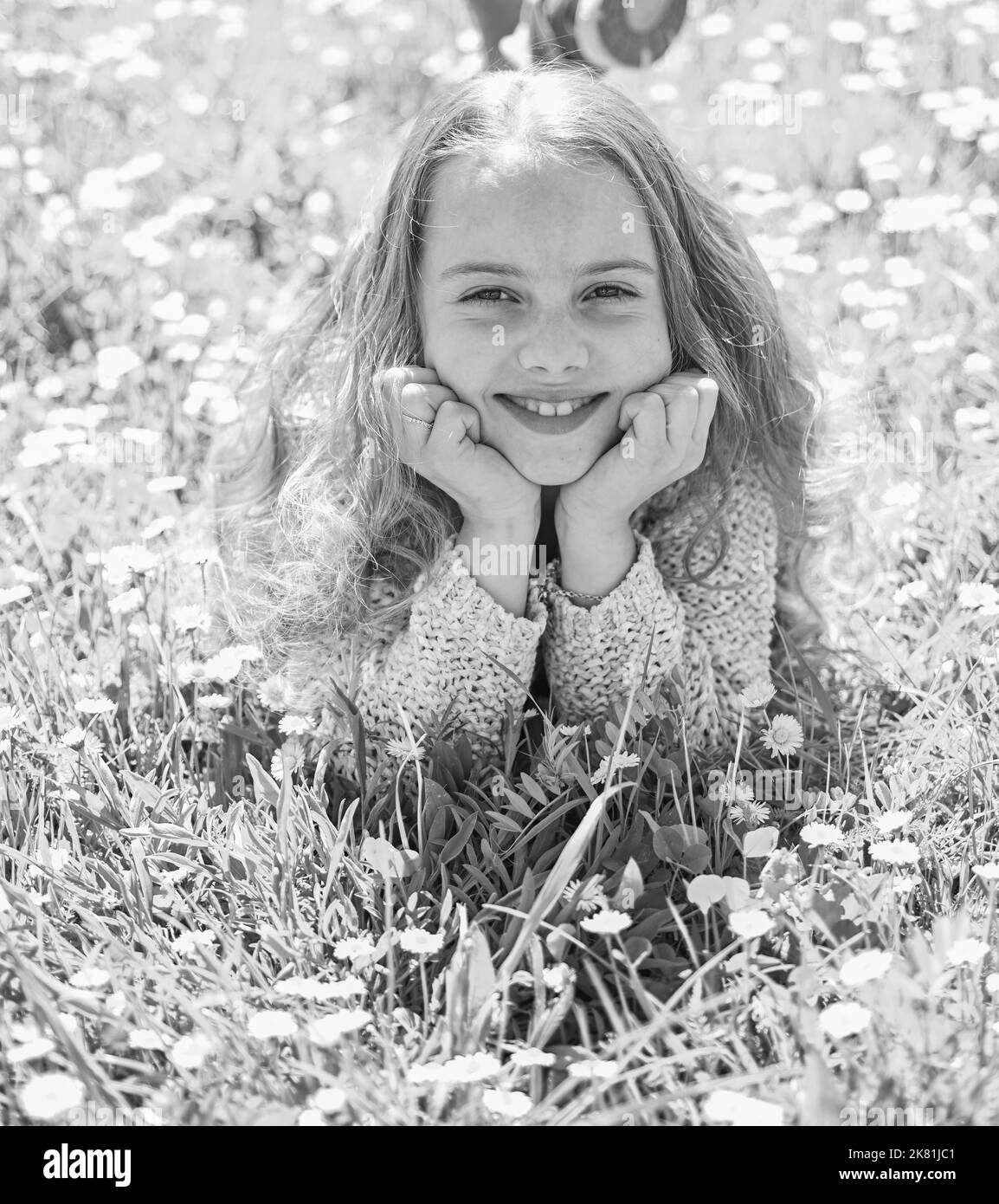 Heyday concept. Girl on smiling face spend leisure outdoors. Girl lying ...