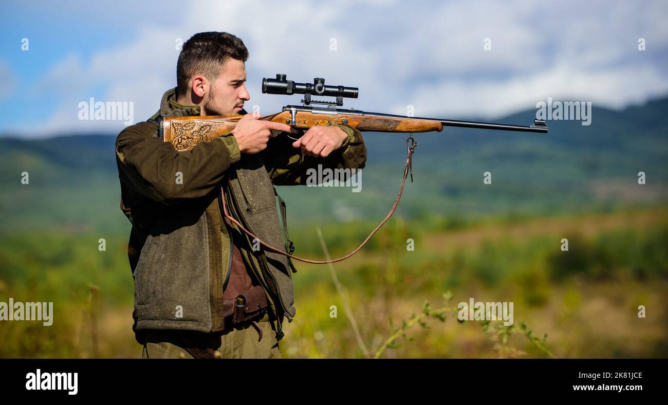 Guy hunting nature environment. Hunting weapon gun or rifle. Masculine ...