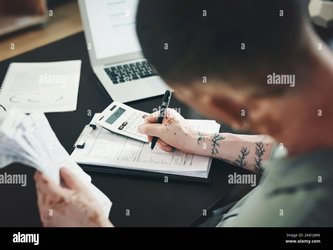 Are my calculations correct. an unrecognizable businessman doing ...