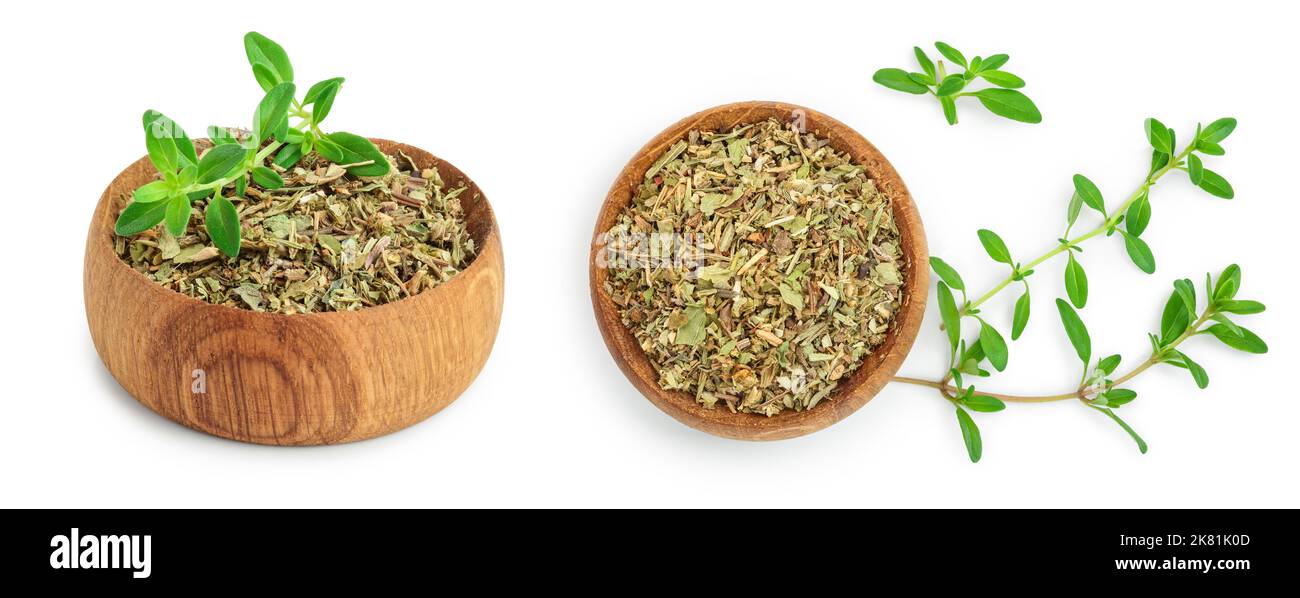 Dried thyme leaves in the wooden bowl, with fresh thyme isolated on white background Stock Photo ...