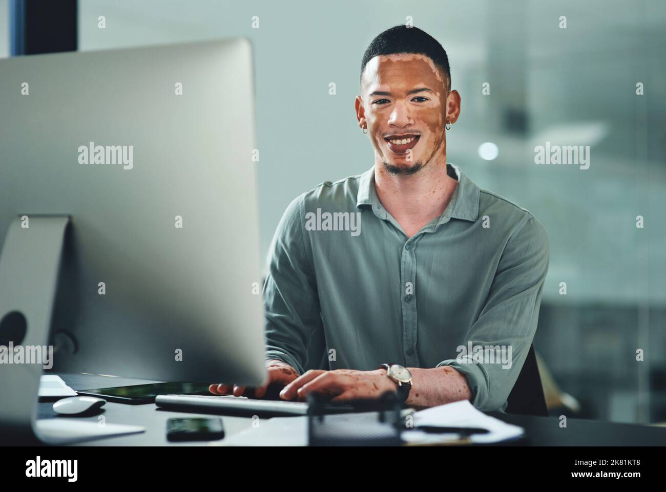 Always making sure my business is sorted. a young businessman using a ...
