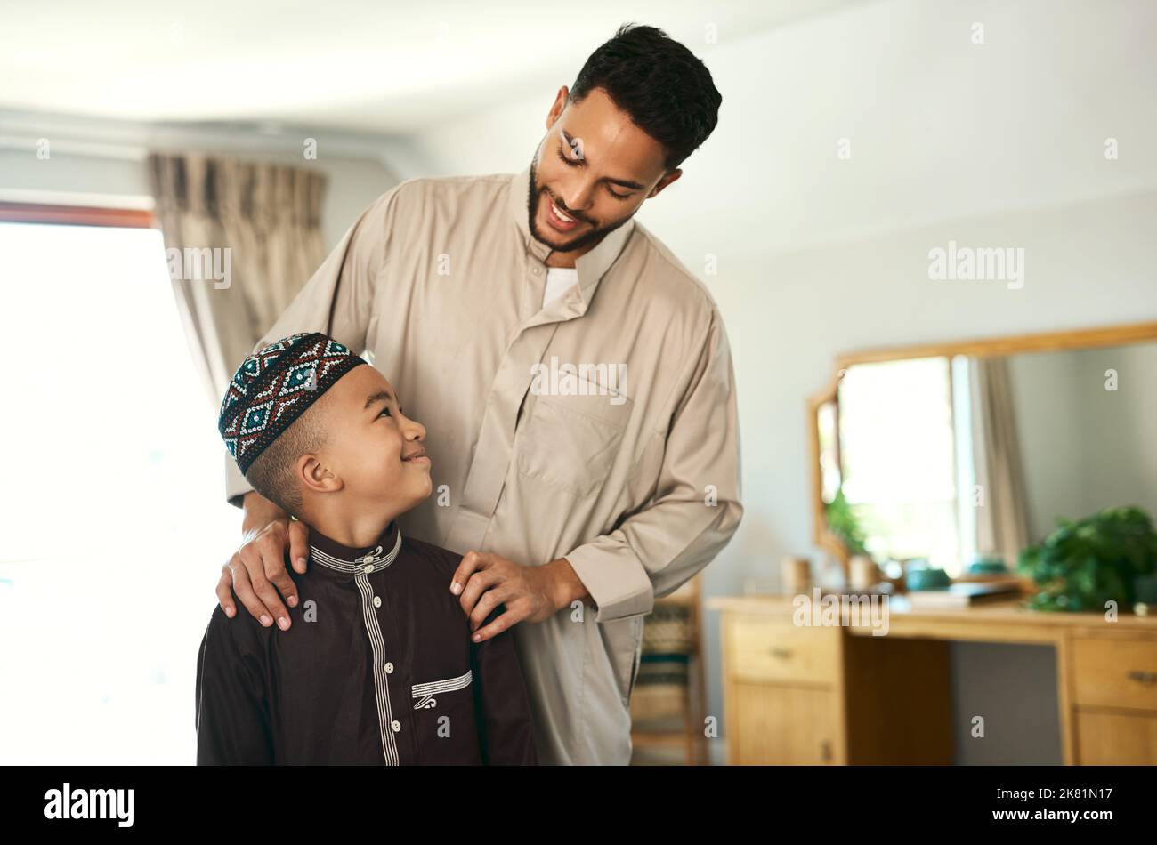 A boys first hero is his dad. Shot a young boy stand with his father at ...