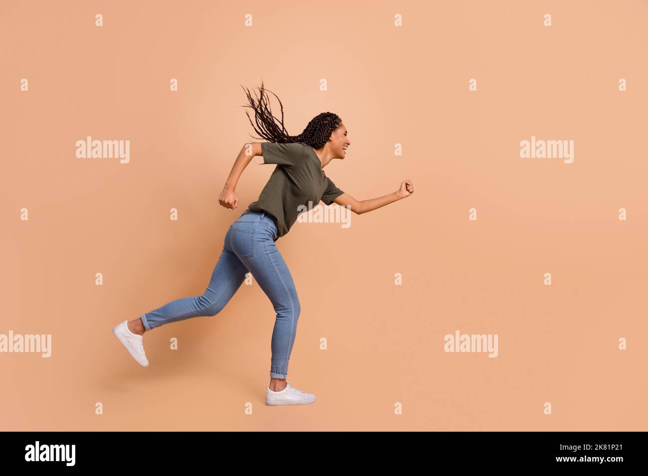 Full size profile portrait of active positive person running look empty ...